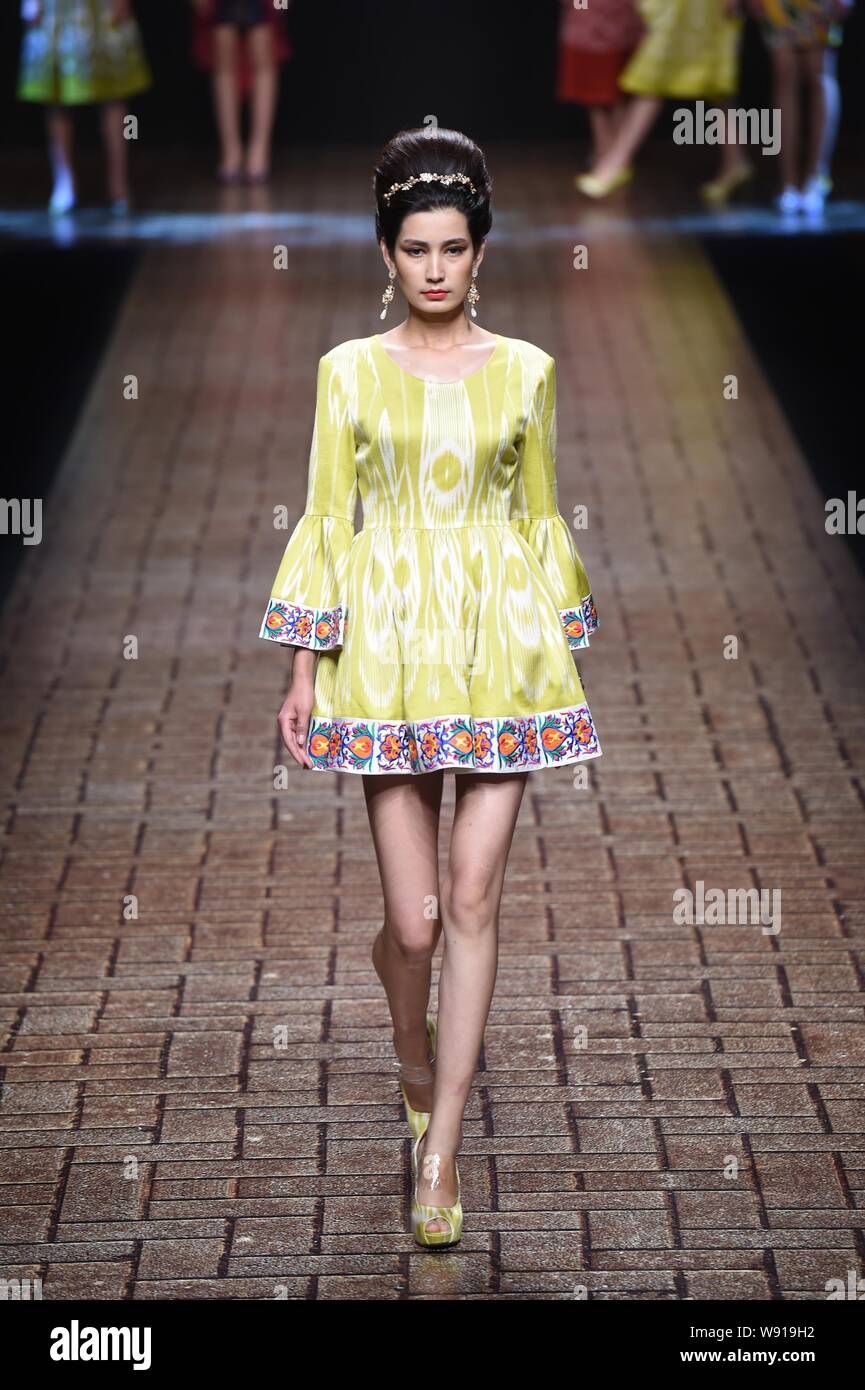 A model displays a new creation by designer Cheng Yingfen at the ...