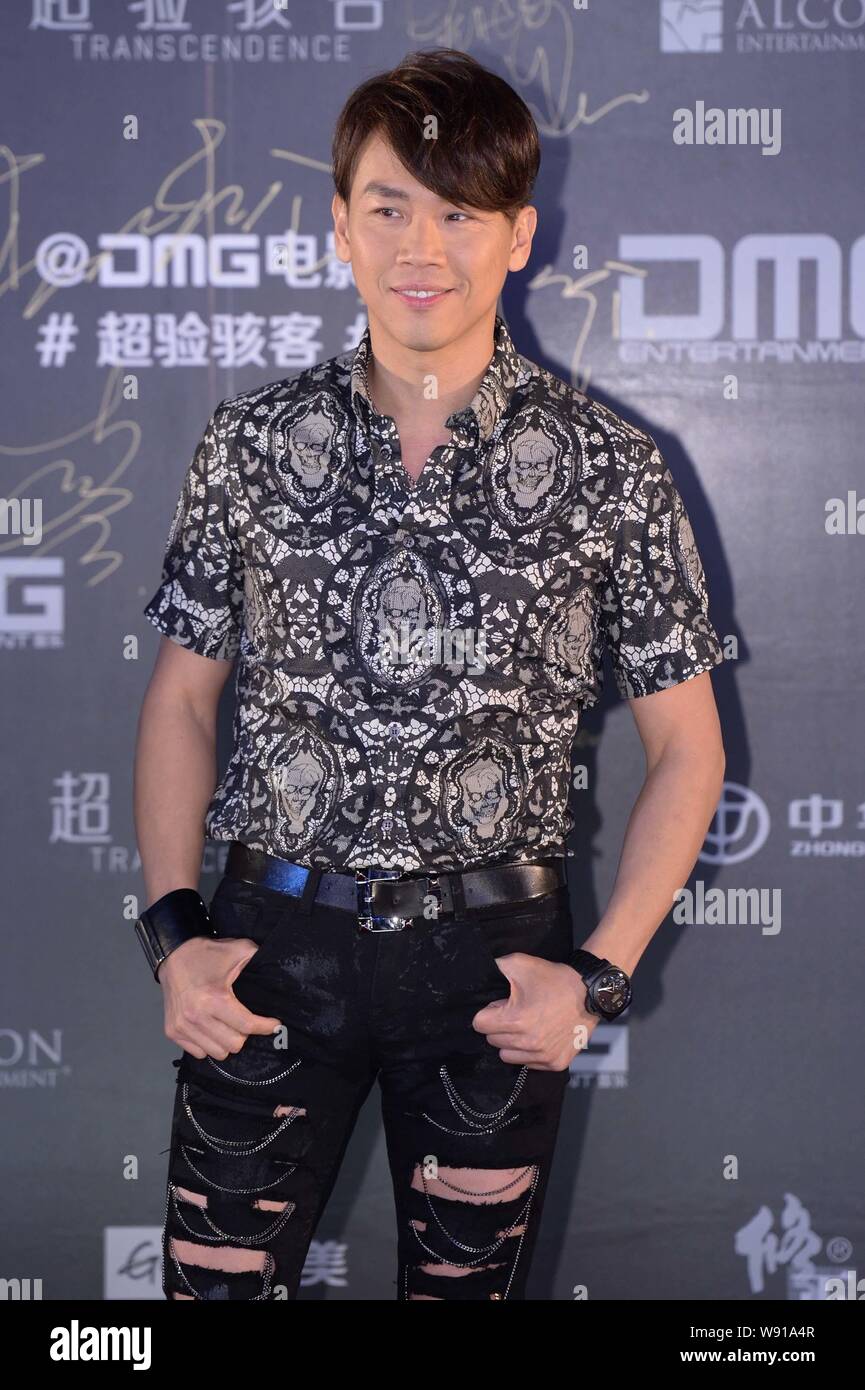 Taiwanese singer David Tao poses on the red carpet as he arrives for a ...