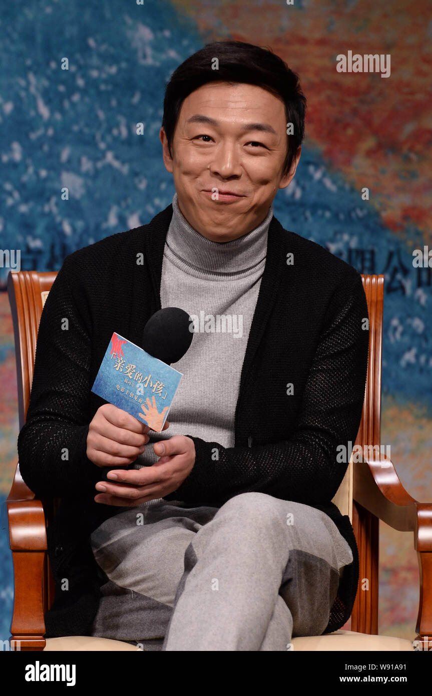 Chinese actor Huang Bo smiles during a cast press conference for his ...