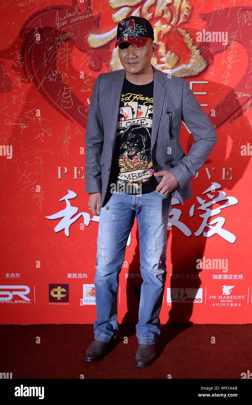 Chinese actor Hu Jun poses as he arrives for the Peace & Love banquet ...