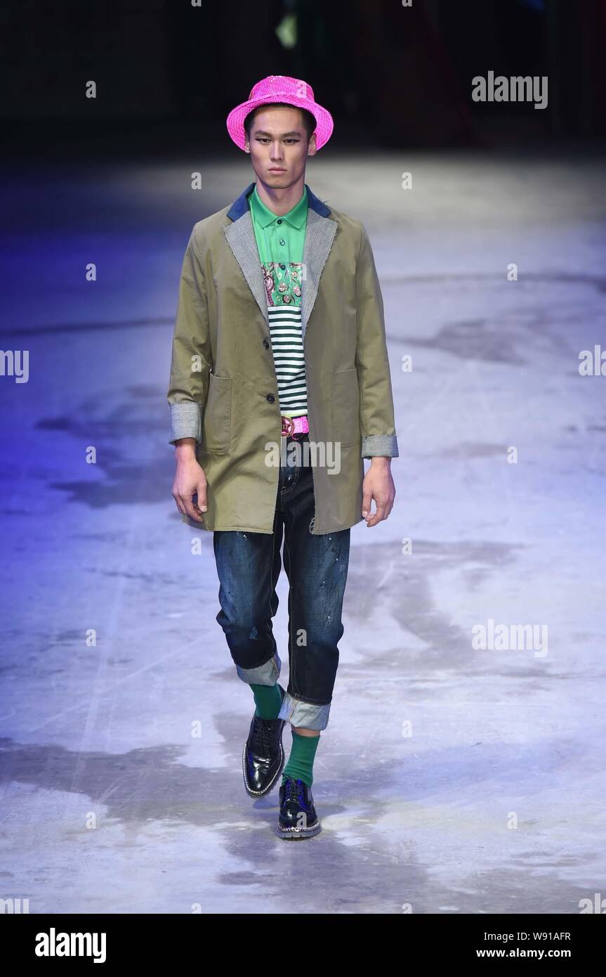 A model displays a new creation by designer Liu Yiqun at the Wolfzone ...