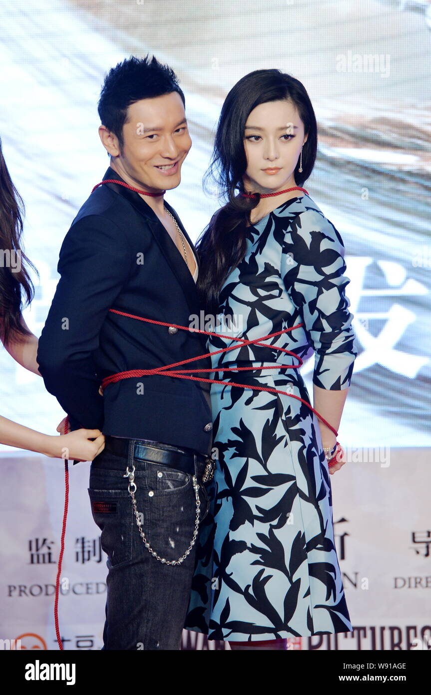Chinese actor Huang Xiaoming, left, and actress Fan Bingbing pose as ...
