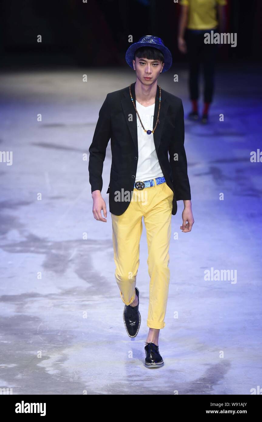 A model displays a new creation by designer Liu Yiqun at the Wolfzone ...