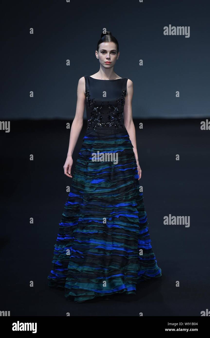 A model displays a new creation by designer Wang Peiyi at the Alex Wang ...