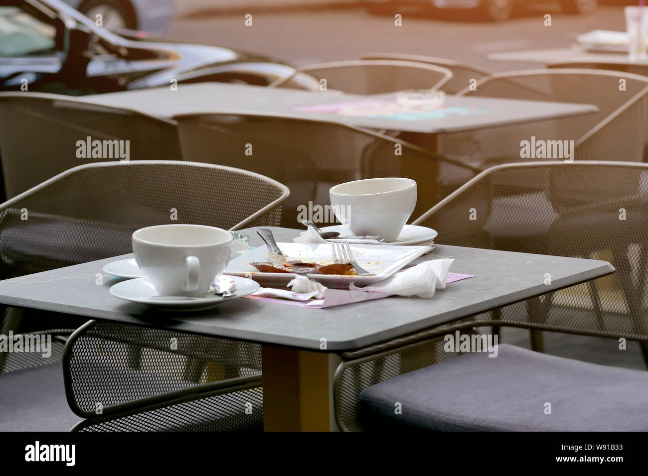 dirty dishes on the table in the cafe Stock Photo - Alamy