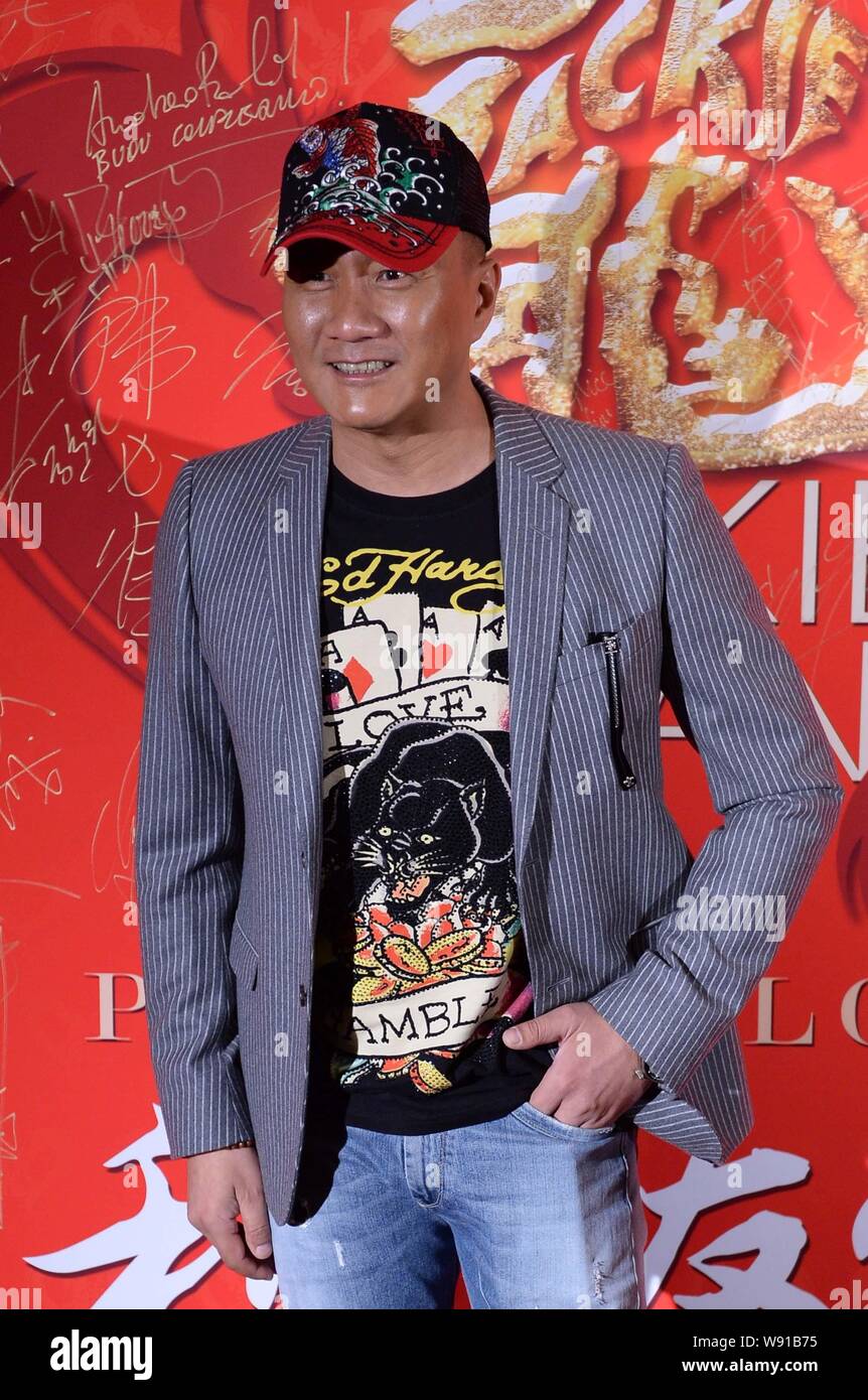 Chinese actor Hu Jun poses as he arrives for the Peace & Love banquet ...