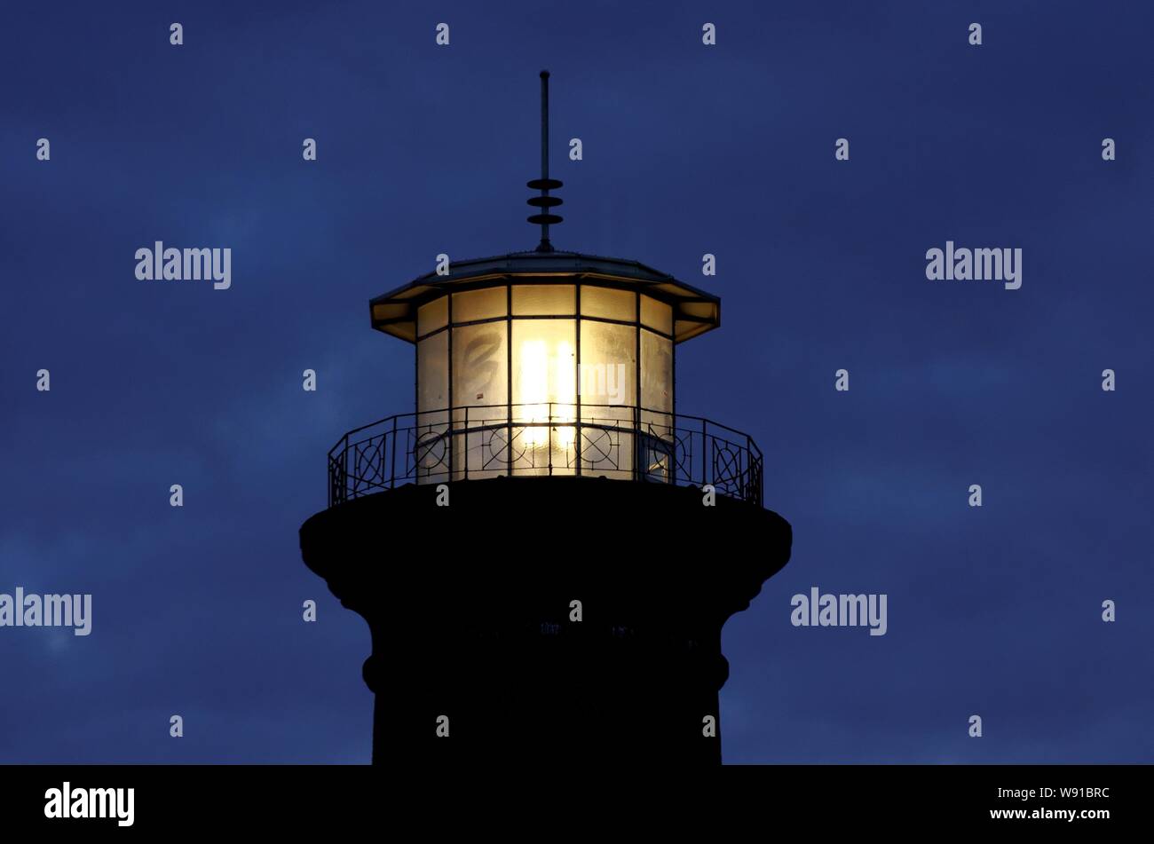 illuminated top of the helios lighthouse in cologne Stock Photo - Alamy