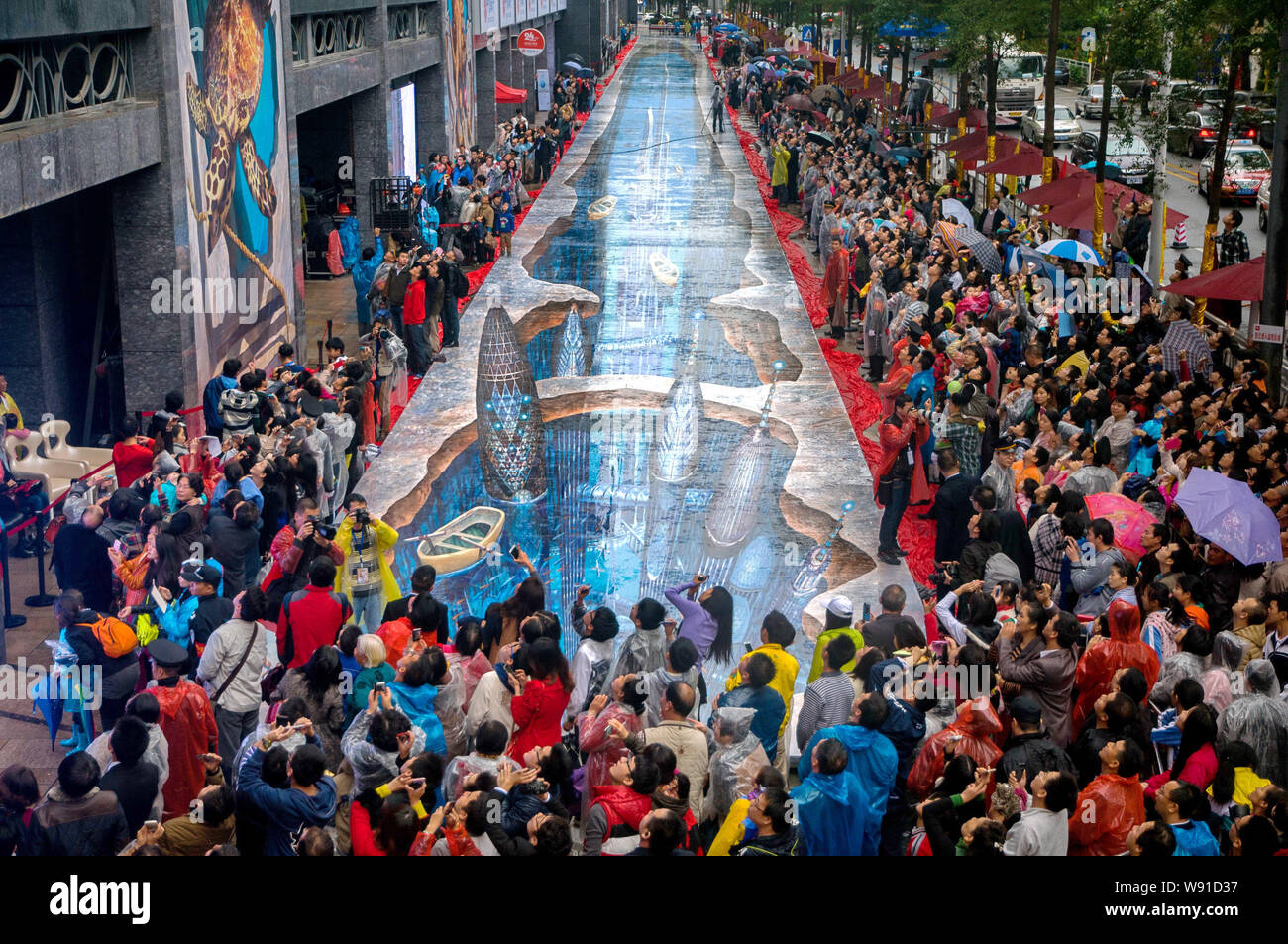 Visitors look at the 200-meter long, 6.1-meter wide 3D painting created ...