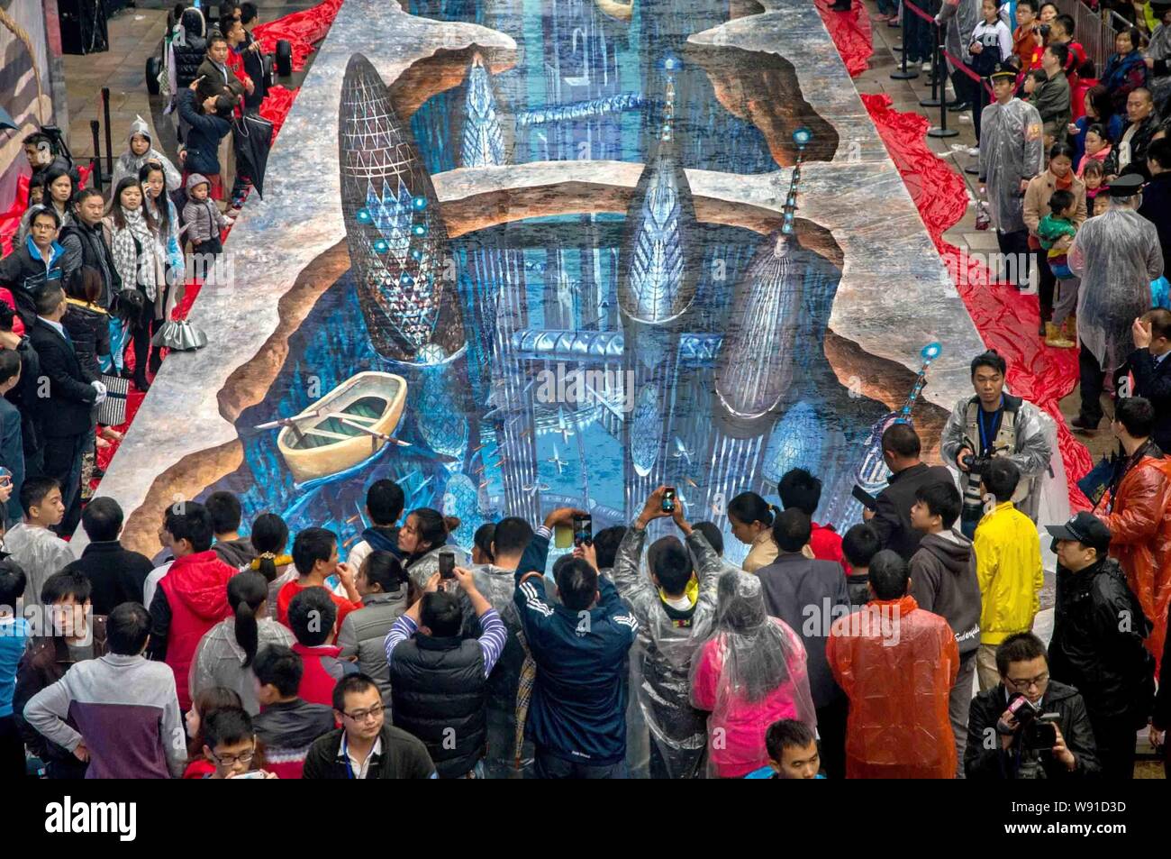 Visitors look at the 200-meter long, 6.1-meter wide 3D painting created ...