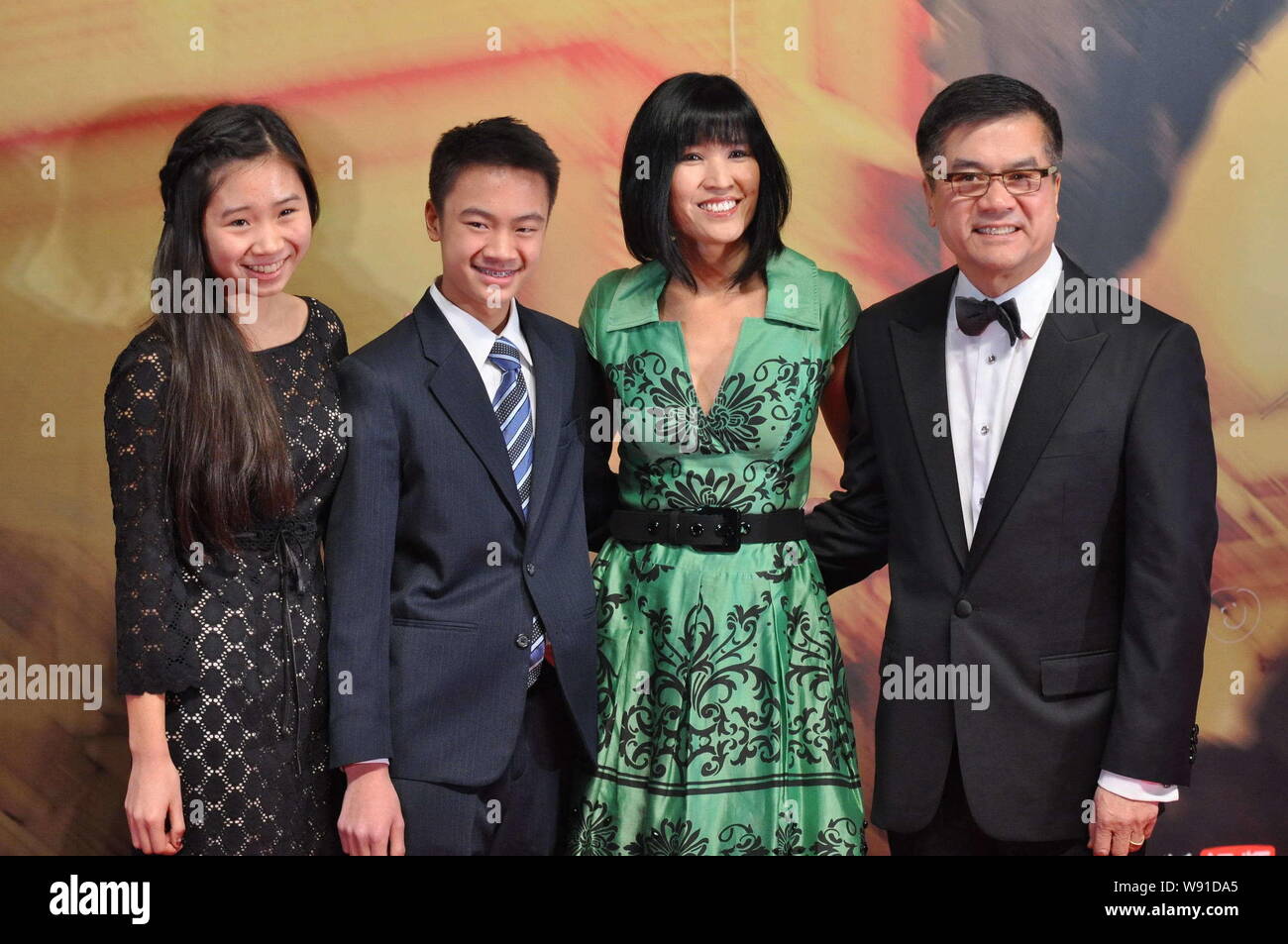 --FILE--U.S. Ambassador to China Gary Locke, right, poses with his ...