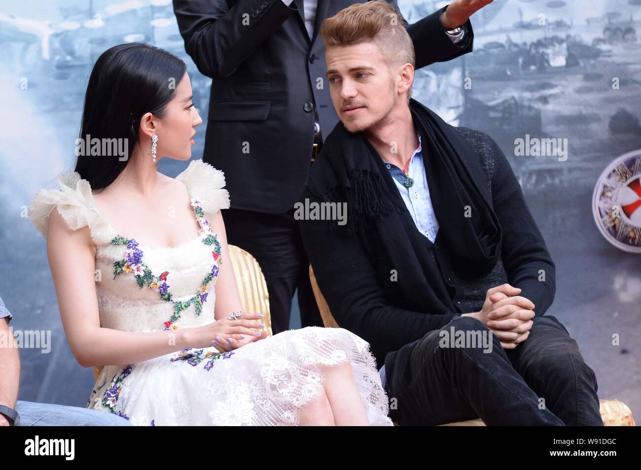 Canadian actor Hayden Christensen, right, speaks to Chinese actress Liu ...