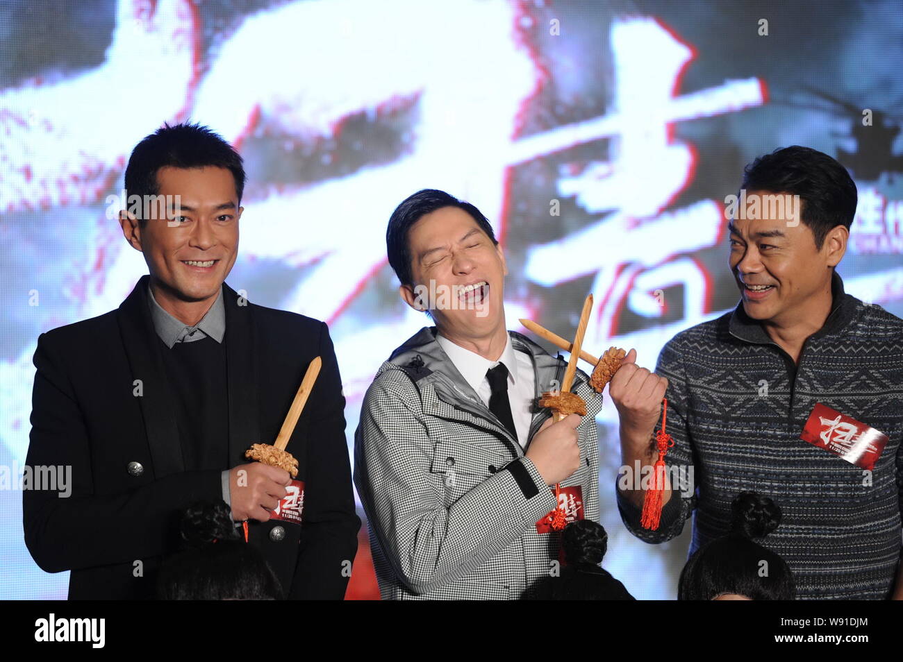 (From left) Hong Kong actor Louis Koo, Hong Kong actor Nick Cheung, and ...