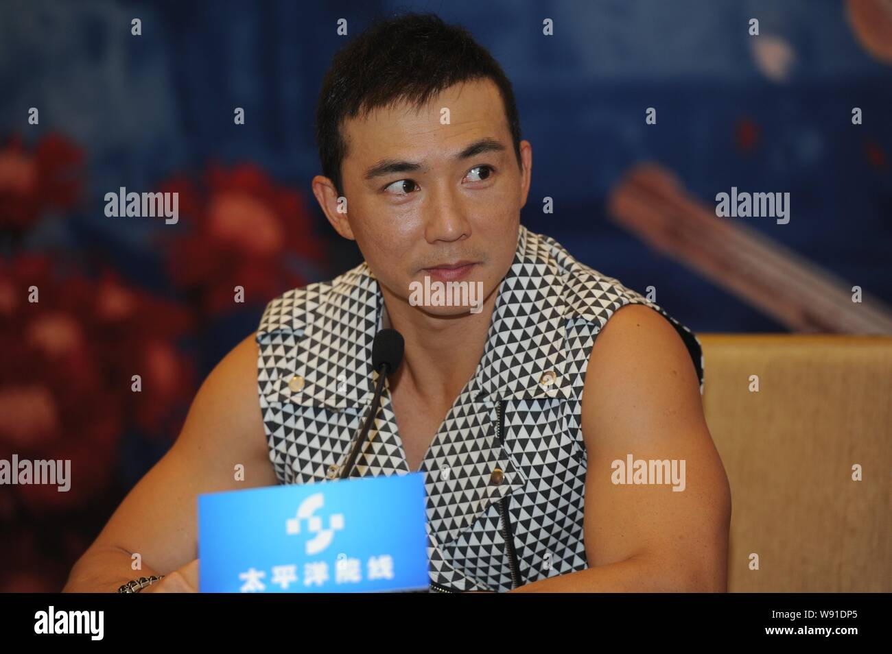 Taiwanese singer and actor Will Liu listens during a press conference ...