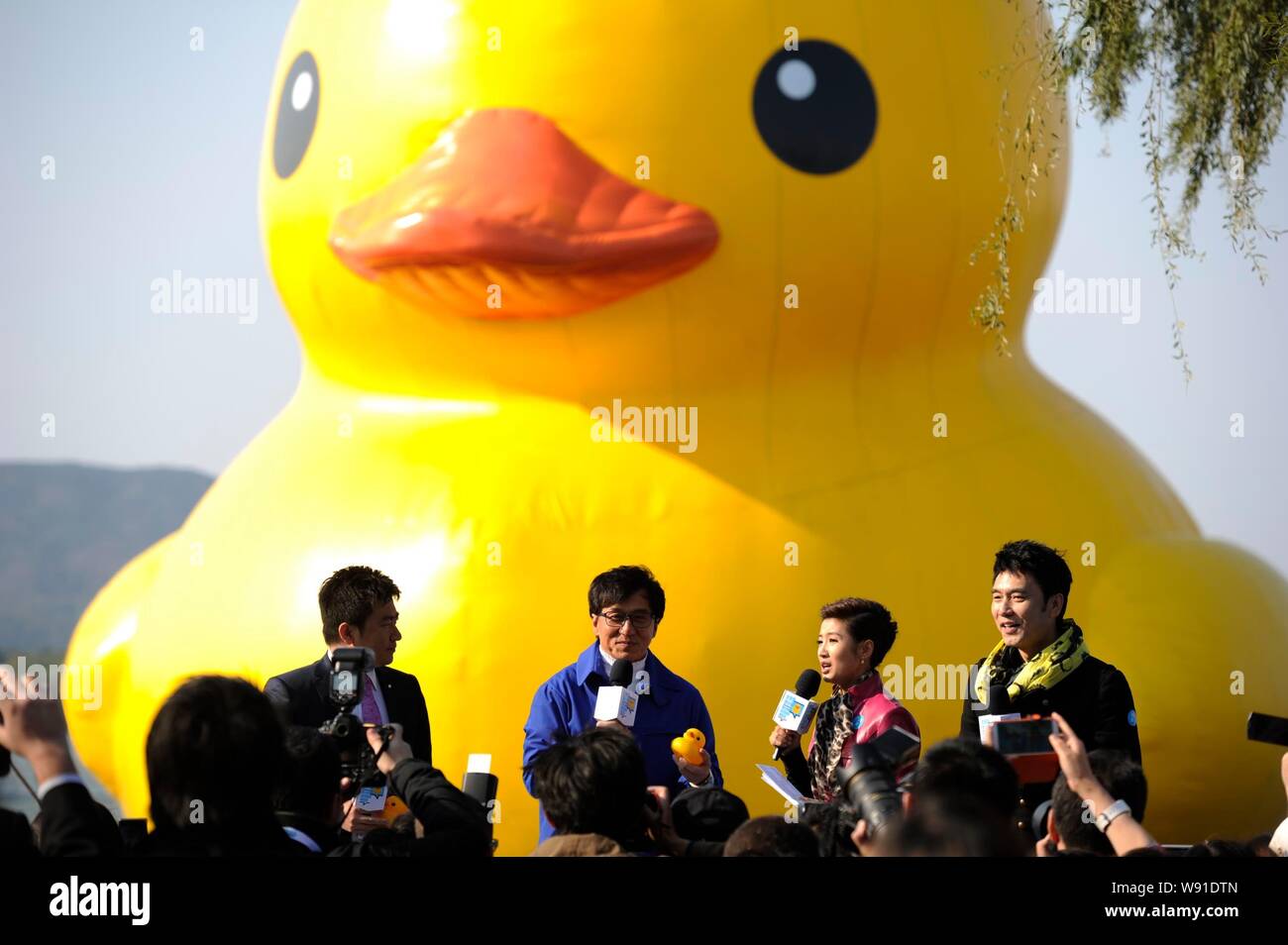 Hong Kong actor Jackie Chan, second left, Chairman of the Chinese ...