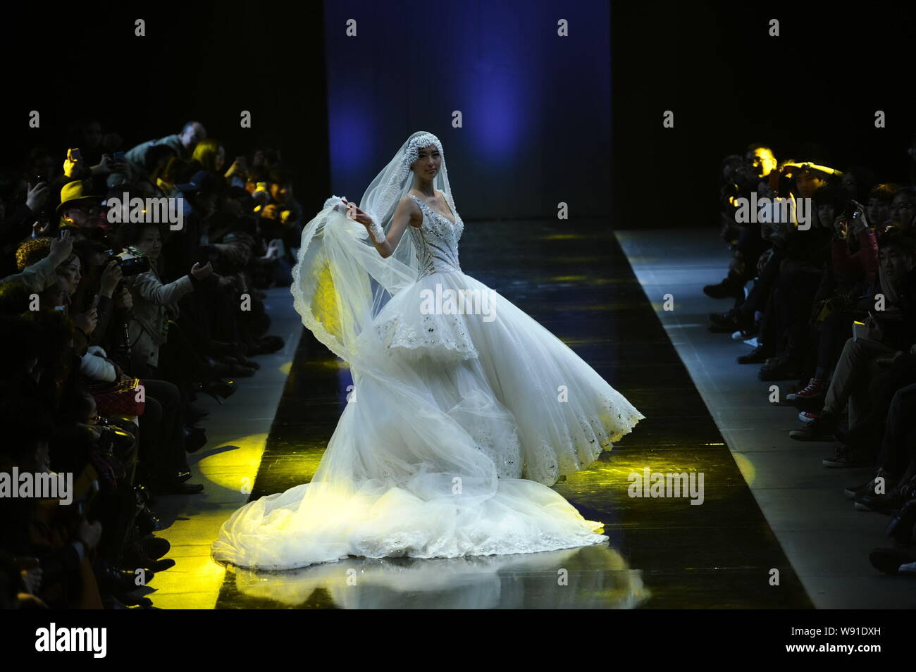 Chinese model Zhai Ling displays a new creation by Chinese fashion ...