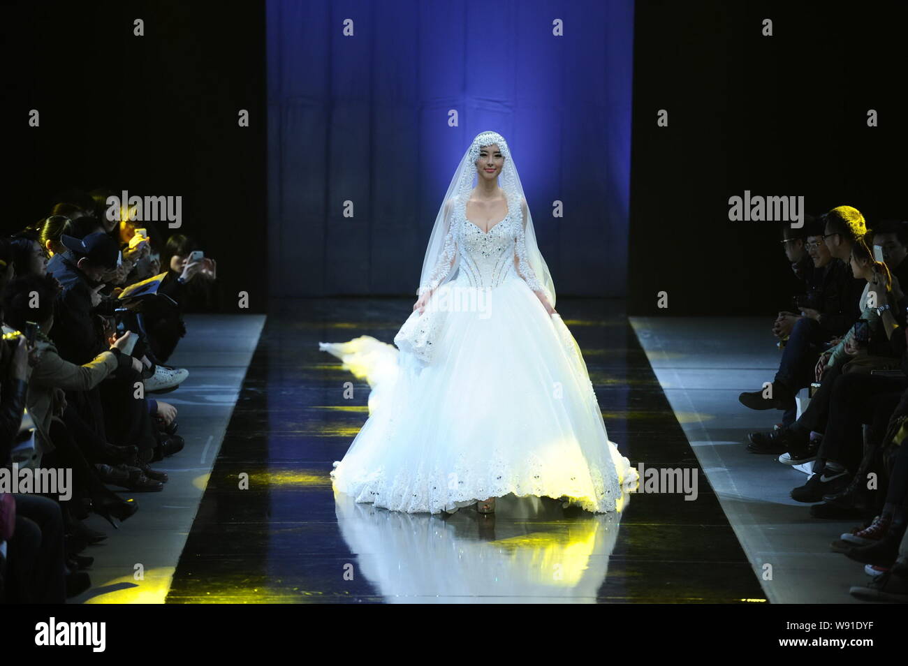 Chinese model Zhai Ling displays a new creation by Chinese fashion ...