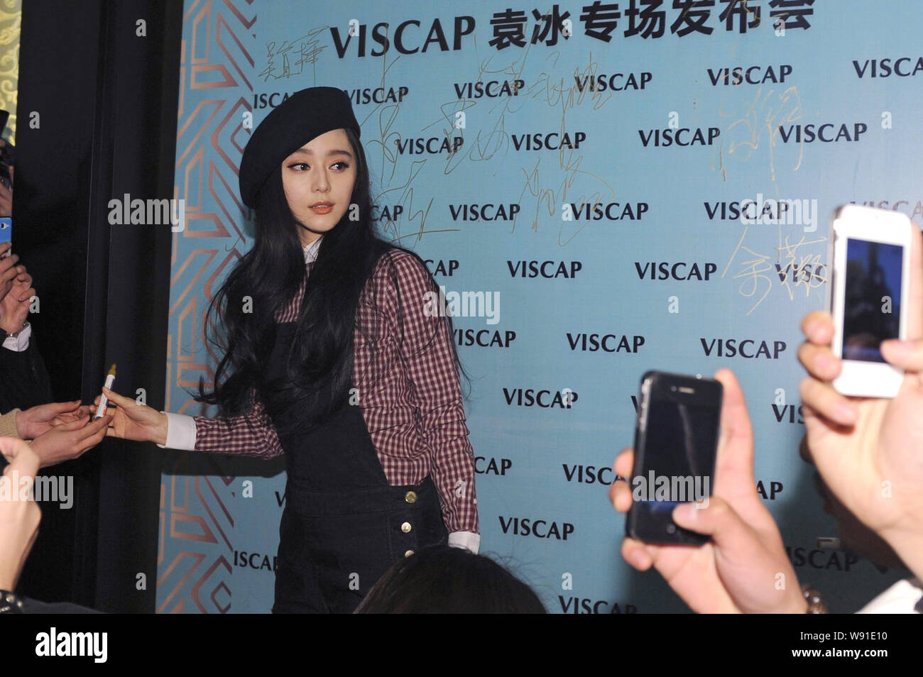 Chinese actress Fan Bingbing (center) poses as she arrives at the ...