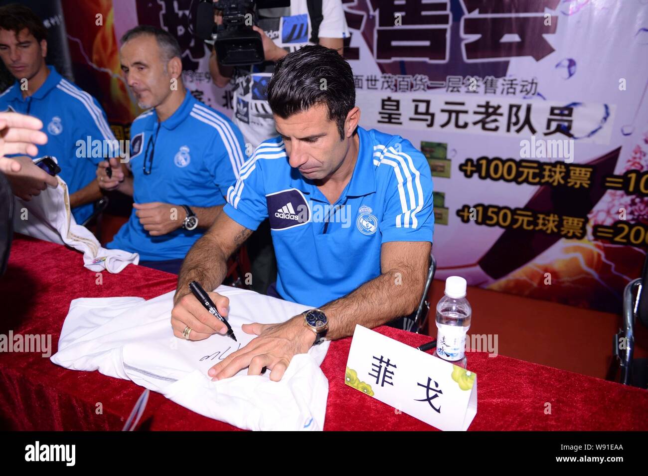 Portuguese football star Luis Figo of Real Madrid Leyendas, right ...