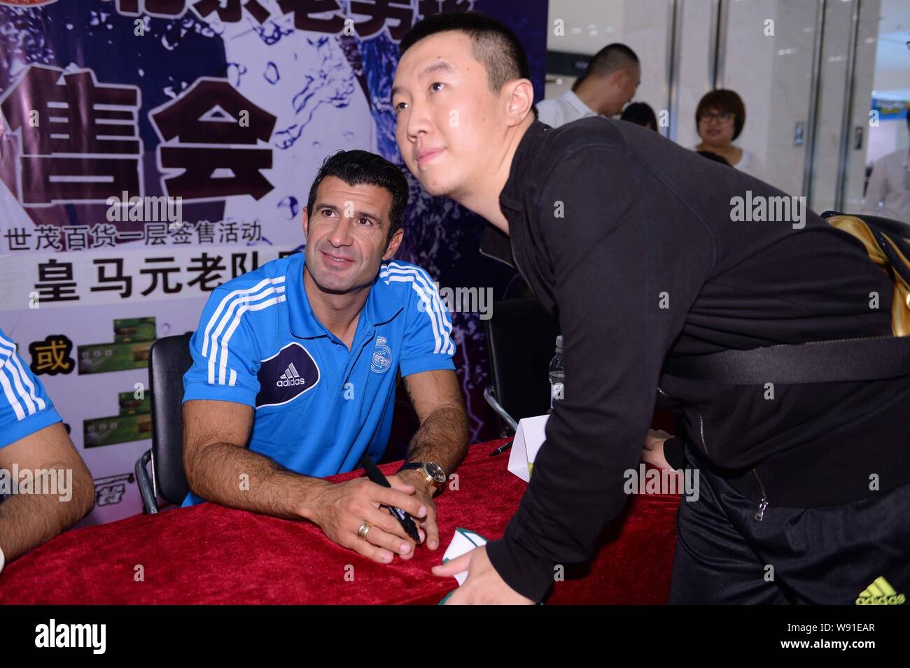 Portuguese football star Luis Figo of Real Madrid Leyendas, left, poses ...