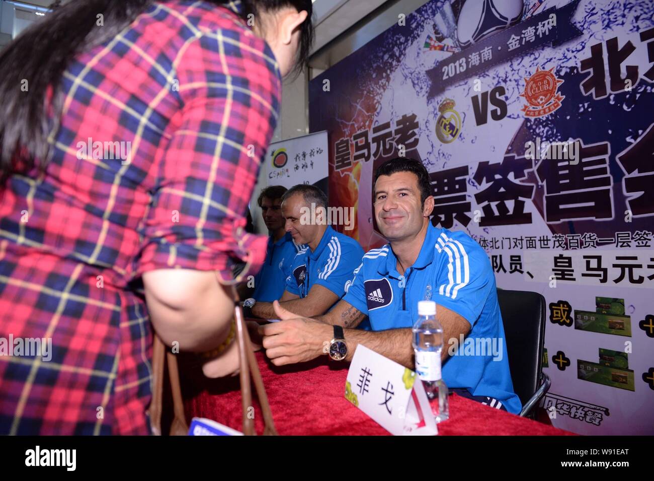 Portuguese football star Luis Figo of Real Madrid Leyendas, right ...