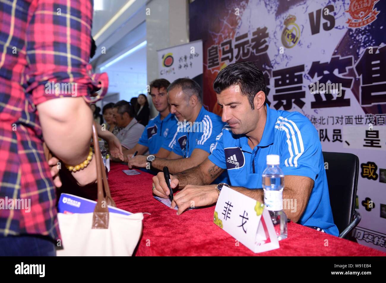 Portuguese football star Luis Figo of Real Madrid Leyendas, right ...