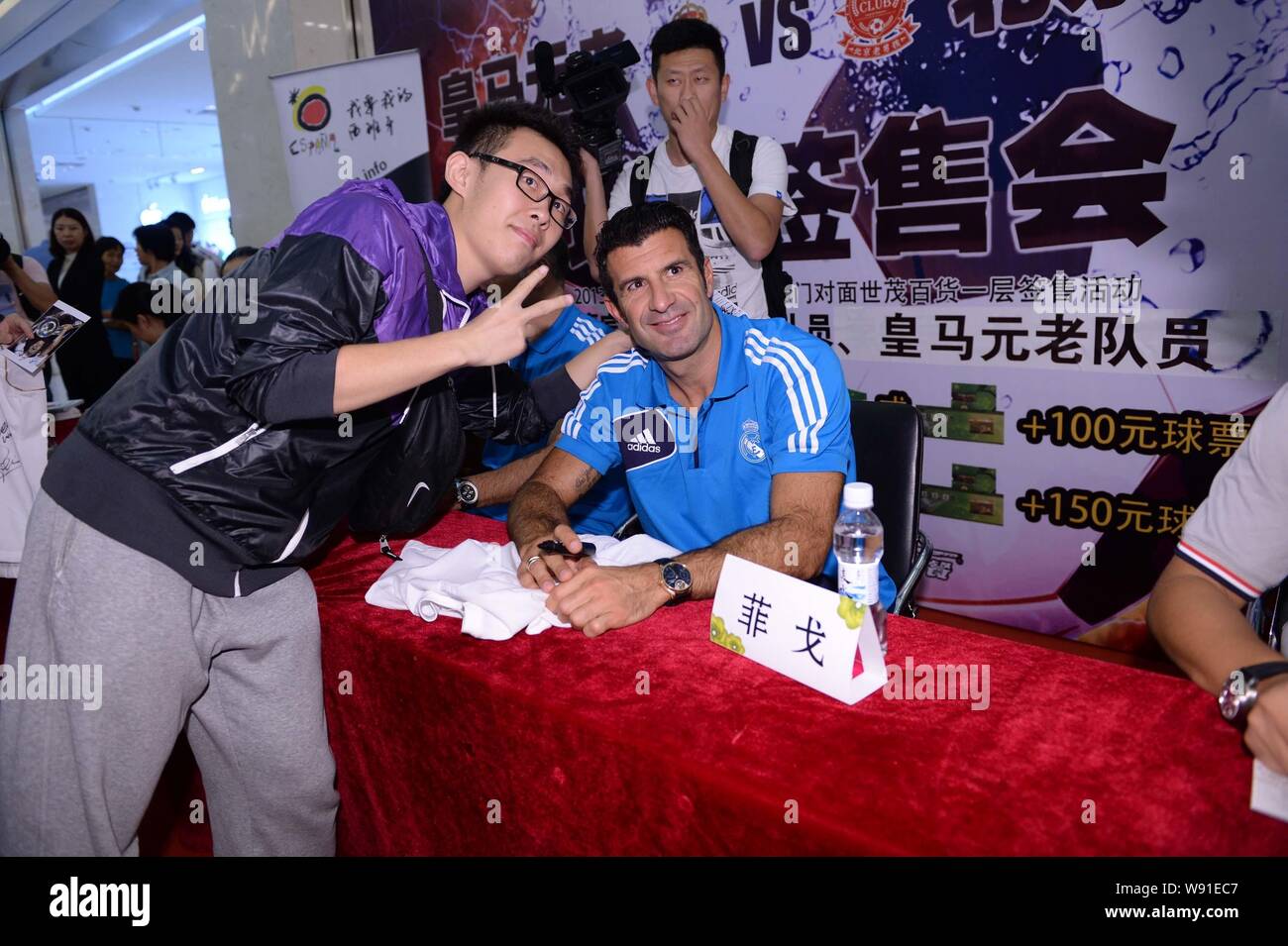 Portuguese football star Luis Figo of Real Madrid Leyendas, right ...