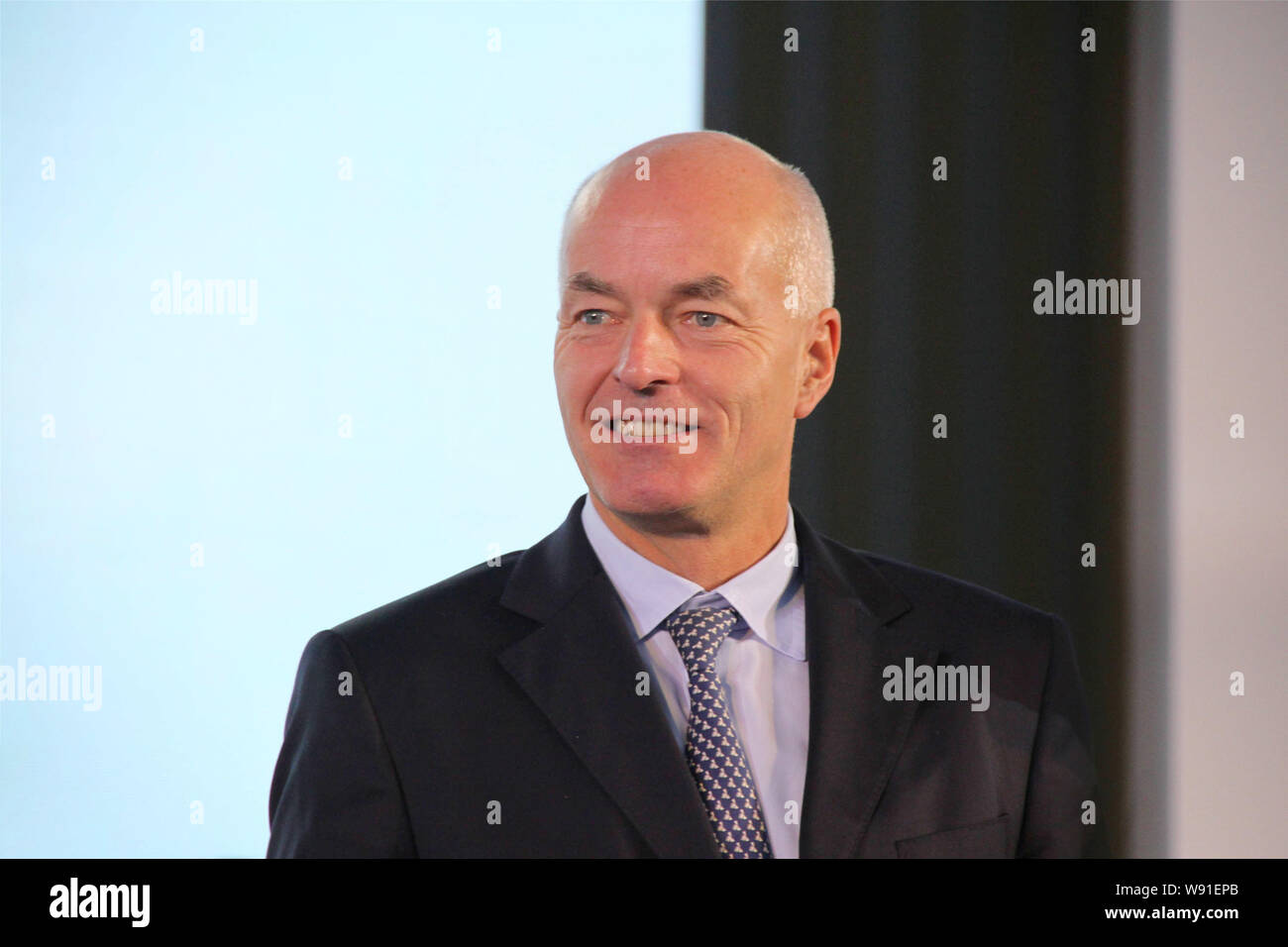 Karsten Engel, President and CEO of BMW Greater China region, smiles at ...