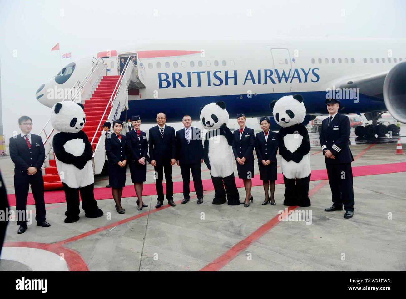 --FILE--Cabin crew members of Flight BA89 from London to Chengdu of ...