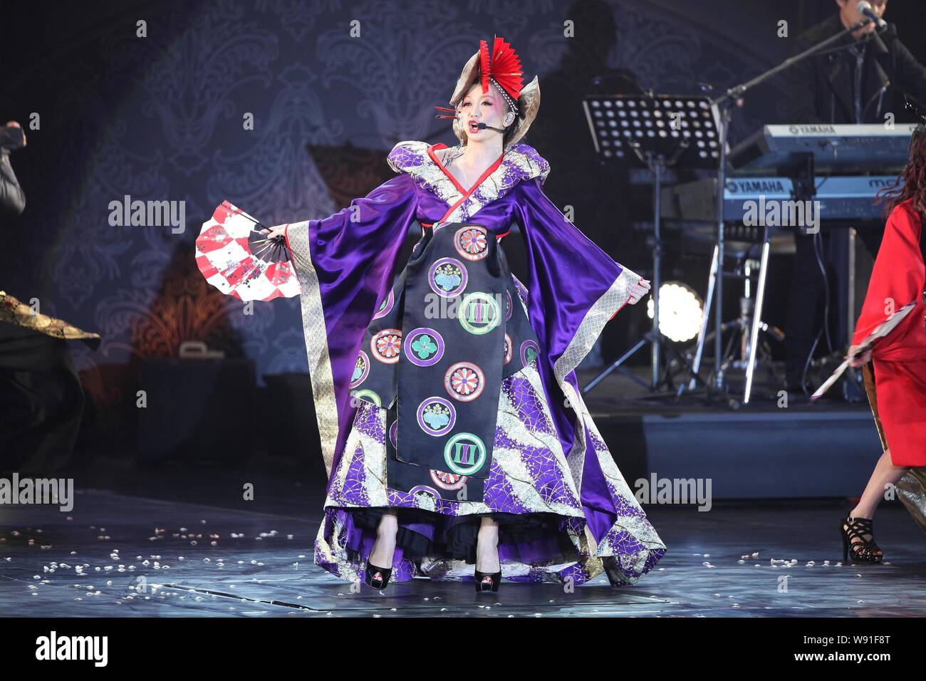 Japanese singer Kumi Koda performs during her Taiwan Live 2013 concert ...