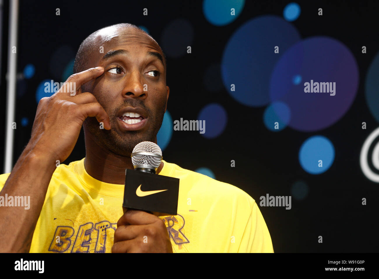 NBA star Kobe Bryant speaks during an interview at a basketball event ...