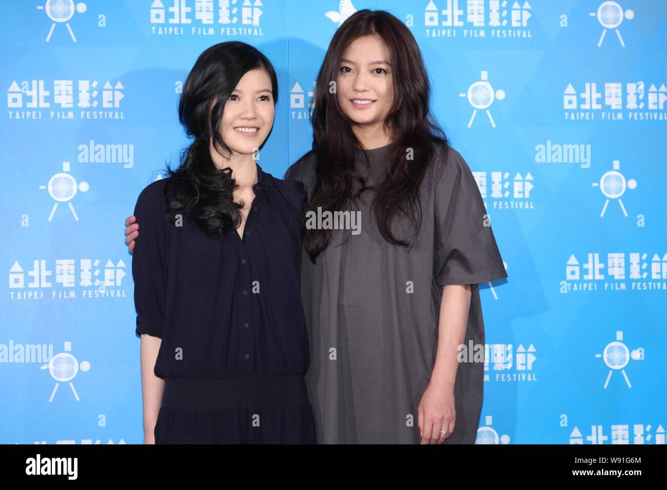 Chinese actress and director Zhao Wei, right, actress Yang Zishan pose ...