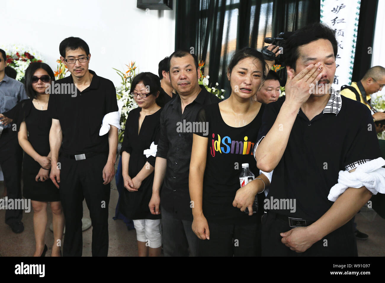 The parents of Chinese students (from left) Liu Yipeng, Ye Mengyuan and Wang Linjia, who died in ...