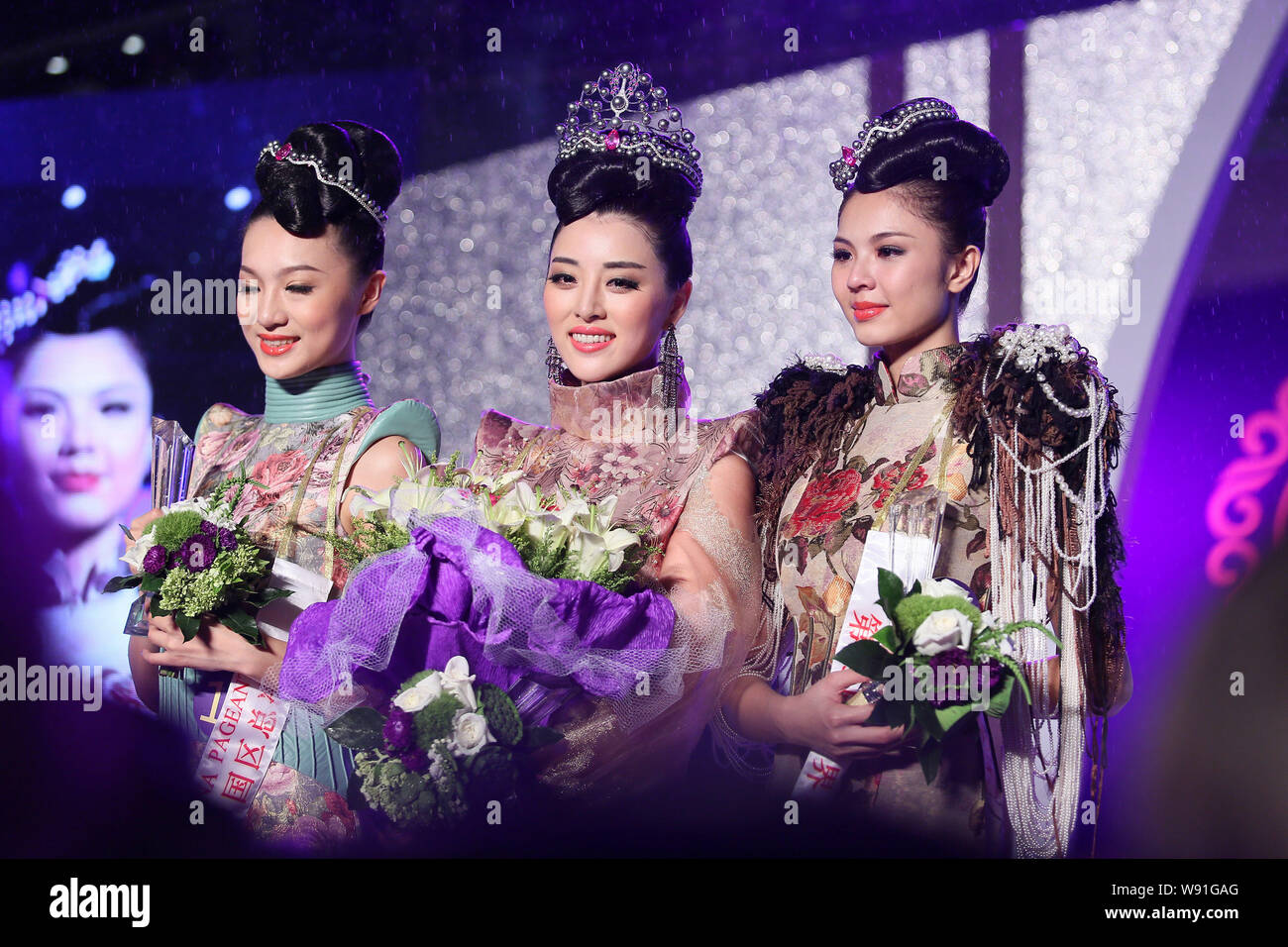 (From left) Second runner-up Jiang Yuanyuan, champion Yu Weiwei and ...