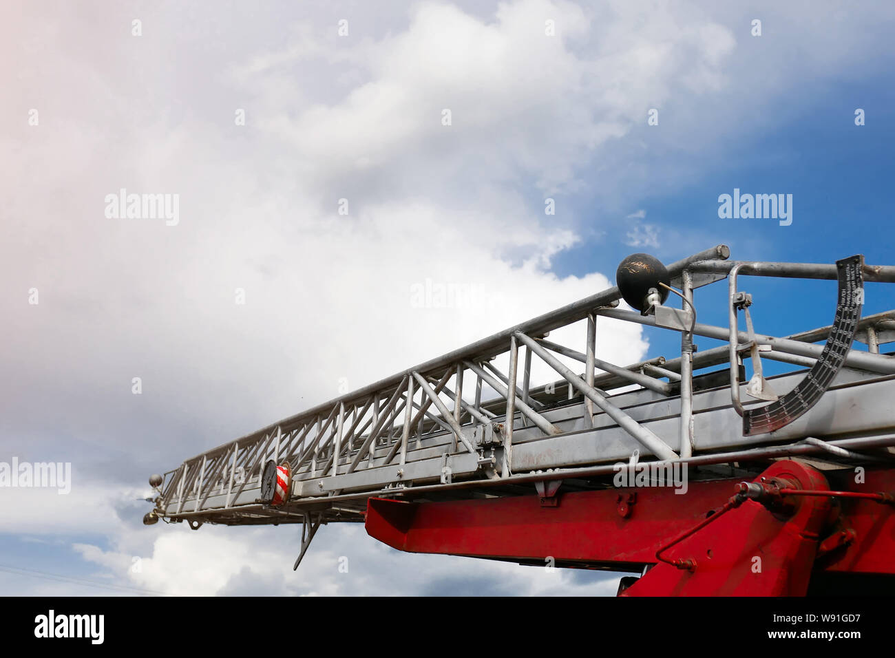 fire escape closeup on blue sky background Stock Photo - Alamy