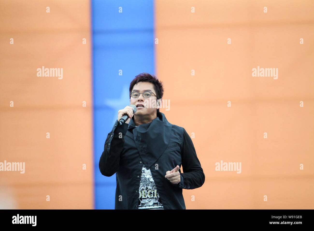 Hong Kong singer and actor Alan Tam performs at the launch ceremony of ...
