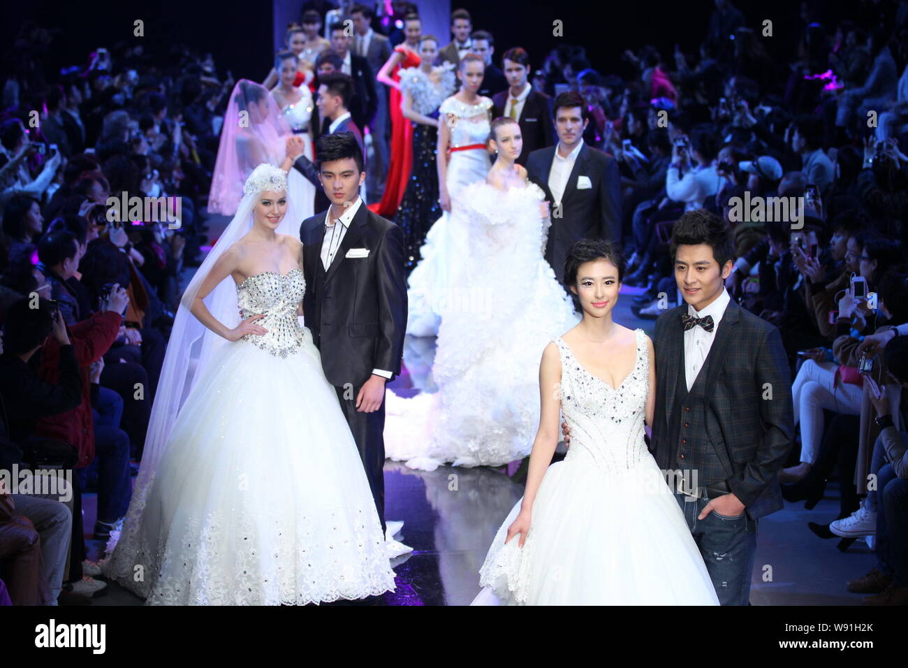 Chinese model Zhai Ling, front left, and other models display new ...