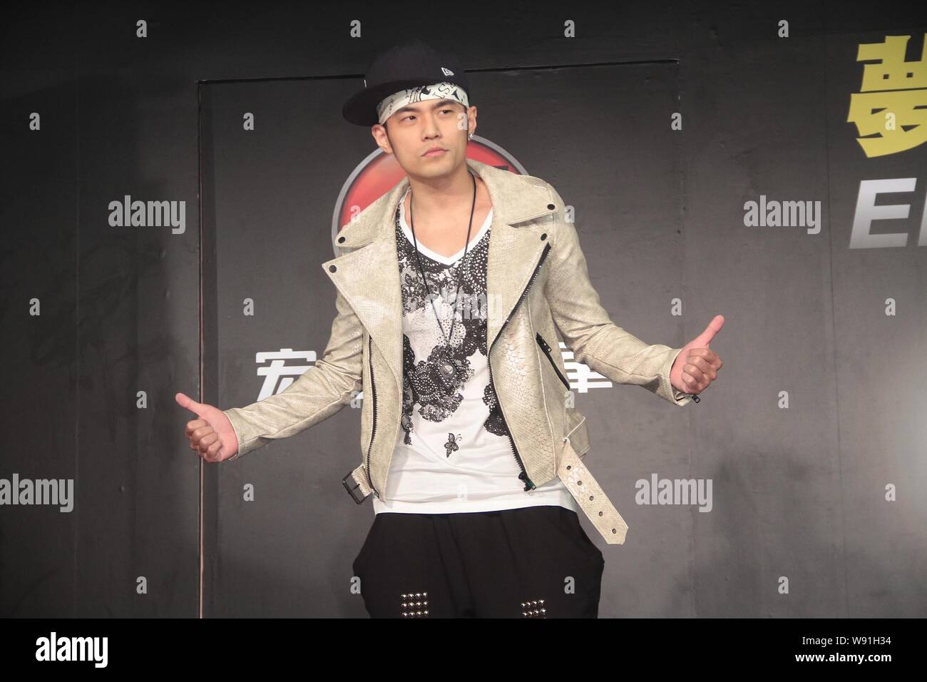 Taiwanese singer and actor Jay Chou poses during the press conference ...