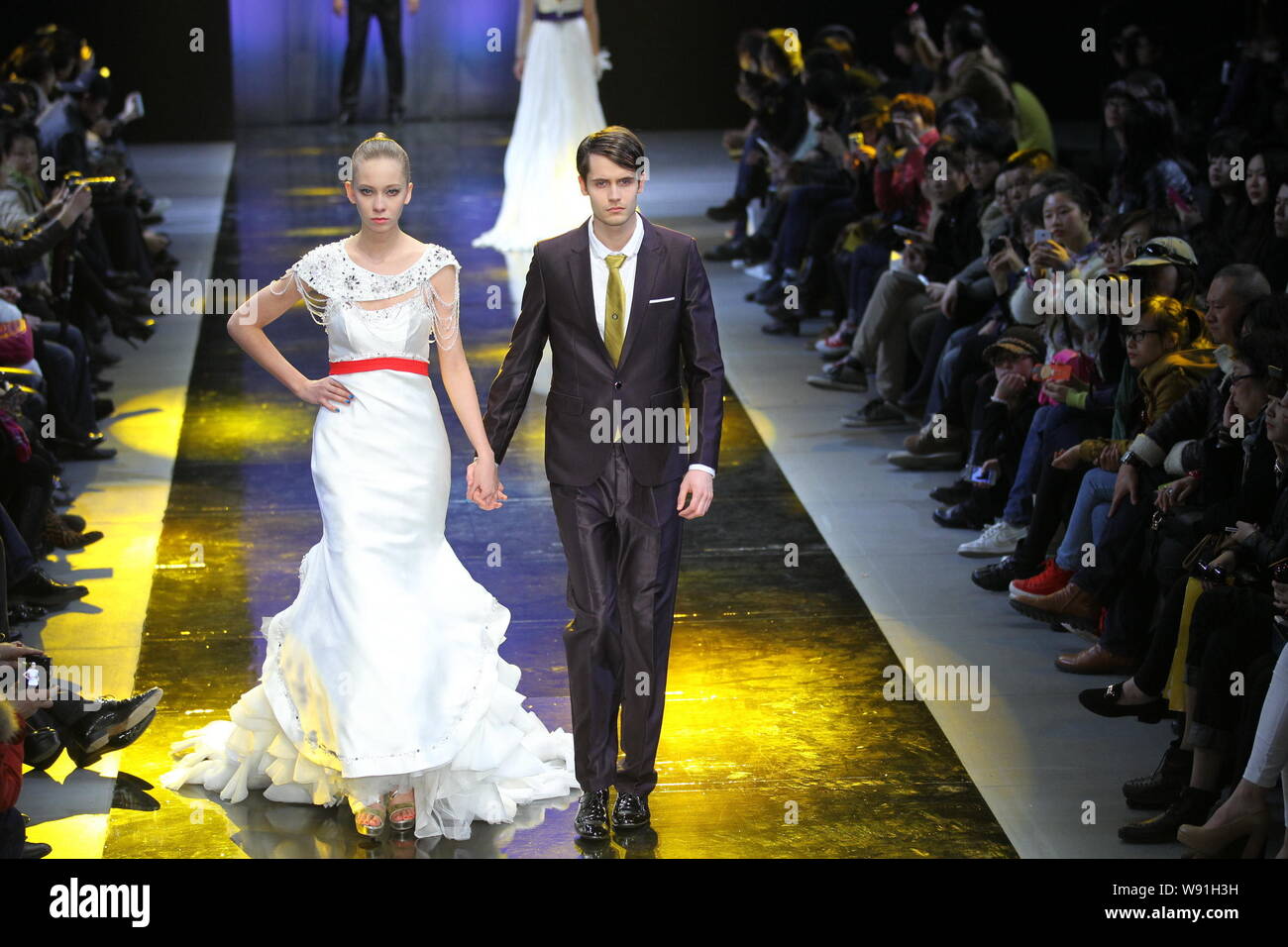 Models display new creations by Chinese fashion designer Mark Cheung in ...