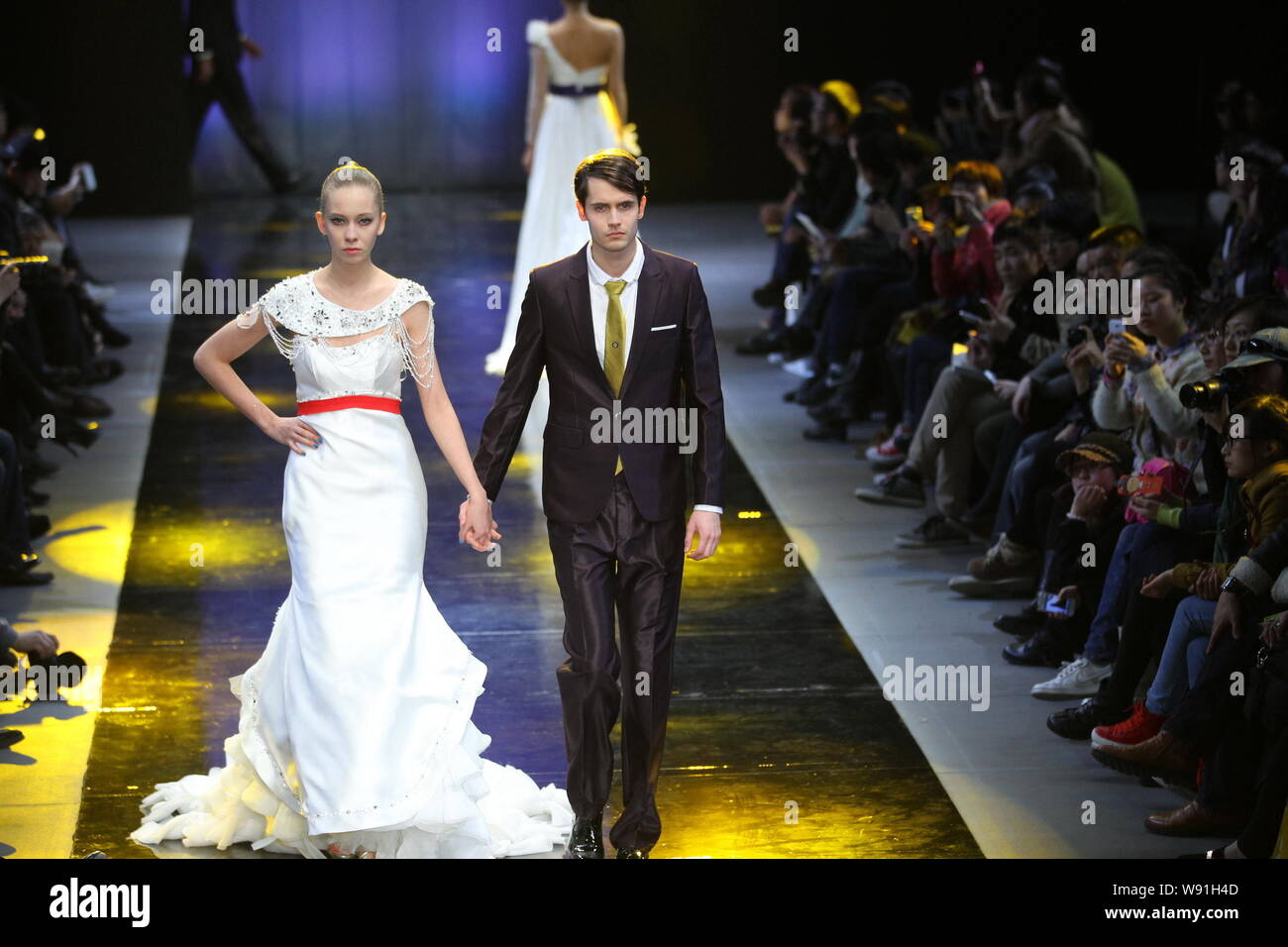 Models display new creations by Chinese fashion designer Mark Cheung in ...