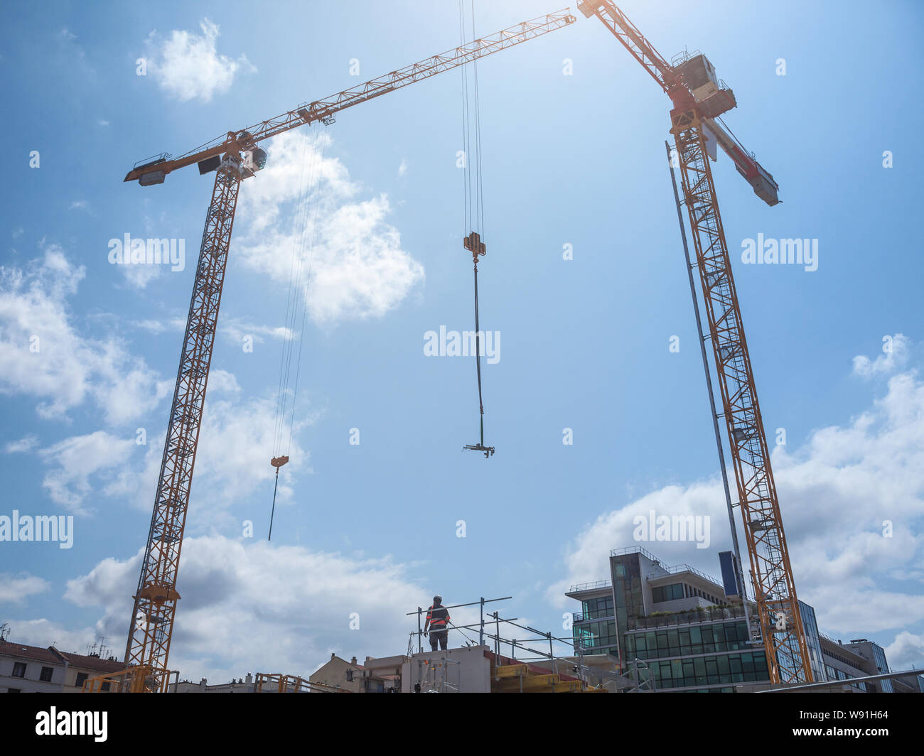 Two building tower crane in hi-res stock photography and images - Alamy