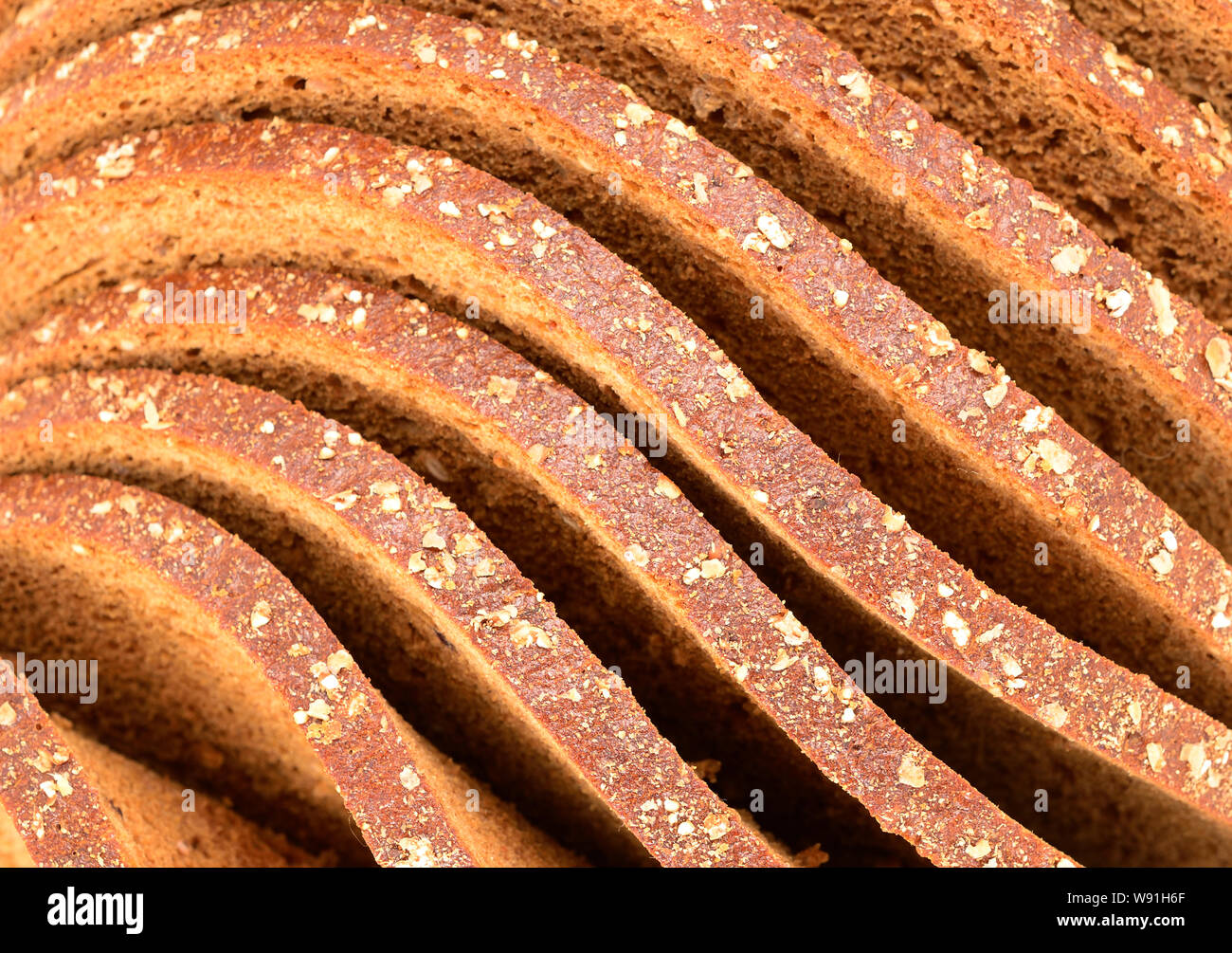 curved slices of bread whole grain rye Stock Photo - Alamy