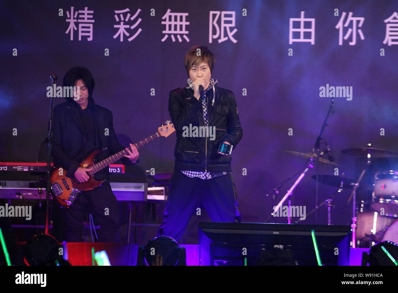 Members of Taiwanese rock band Mayday perform during the launch ...