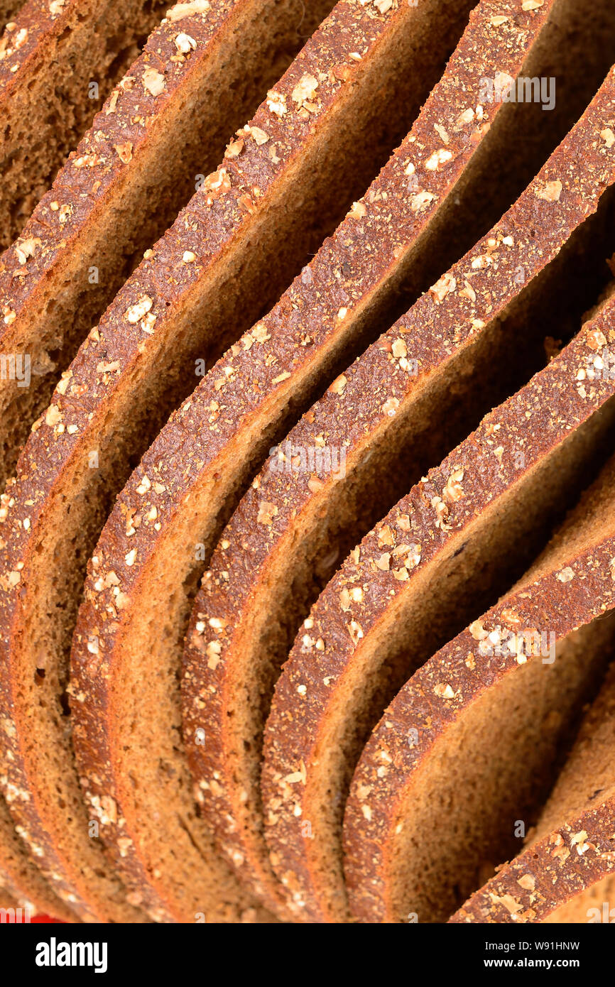 curved slices of bread whole grain rye Stock Photo - Alamy
