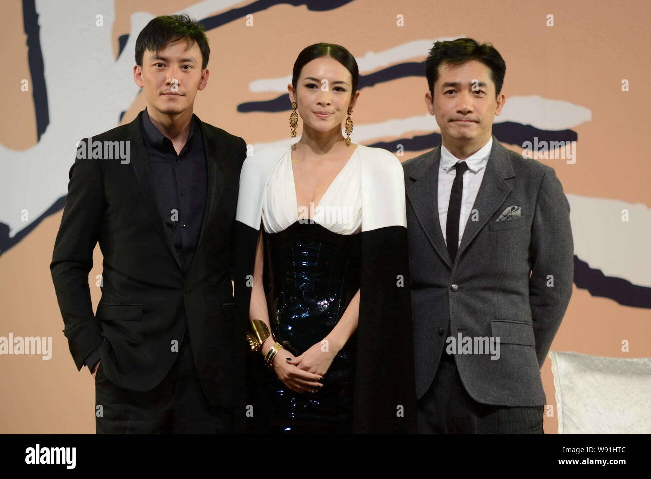 Taiwanese actor Zhang Zhen (left), Chinese actress Zhang Ziyi (center ...