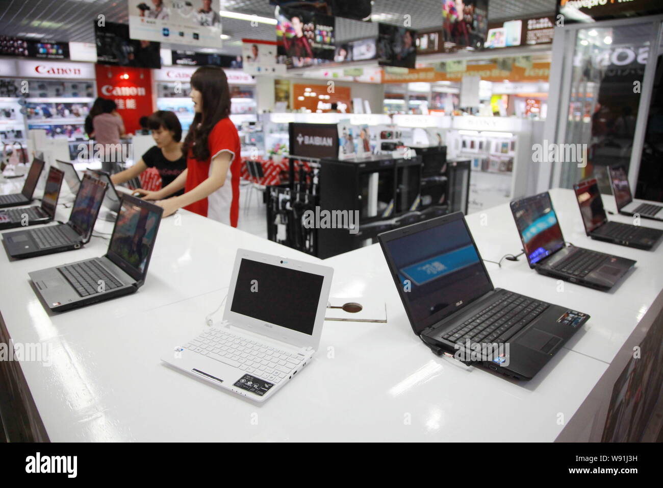 --FILE--Asus laptop computers are for sale at a store in Haikou city ...