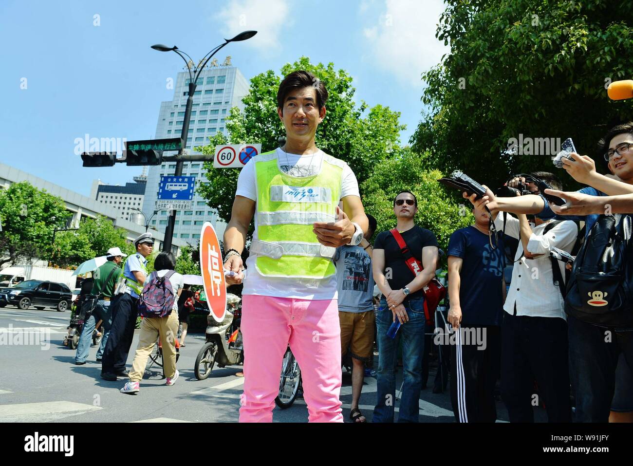 Taiwanese singer and actor Richie Jen is interviewed as he directs ...