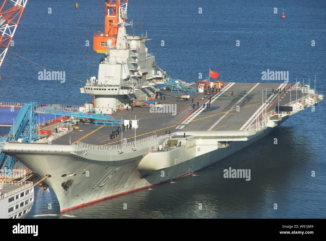 Chinas first aircraft carrier, the Liaoning, is seen in Dalian port ...