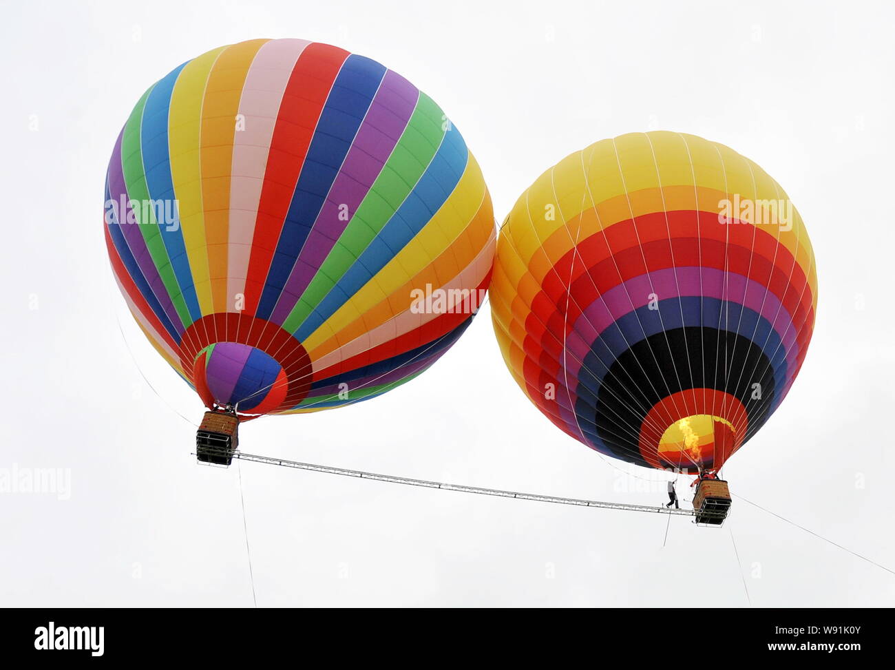 Chinese Uighur tightrope walker Aisikaier Wubulikaisimu walks on a ...