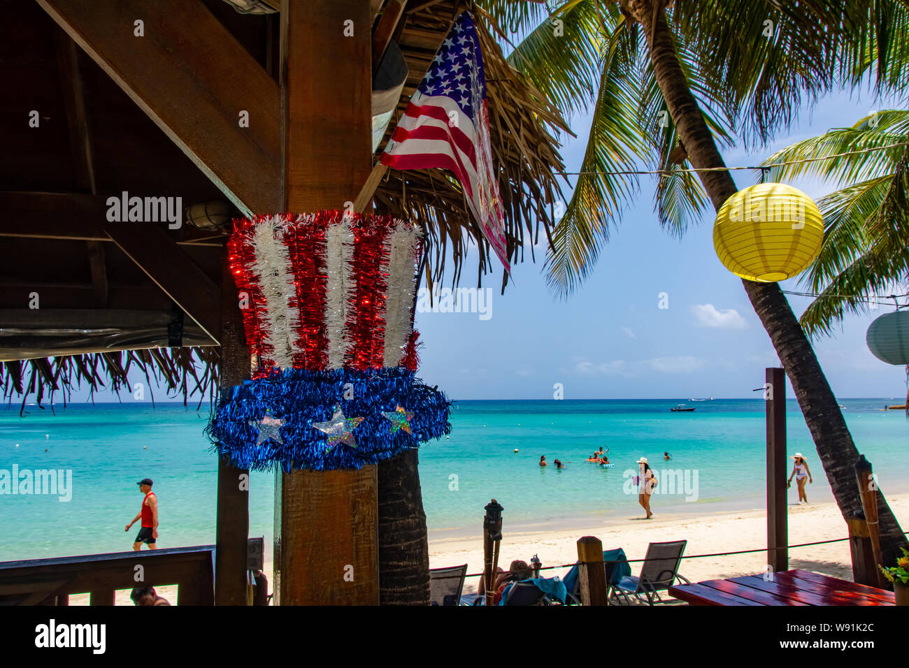 July 4 celebration on Caribbean beach Stock Photo - Alamy