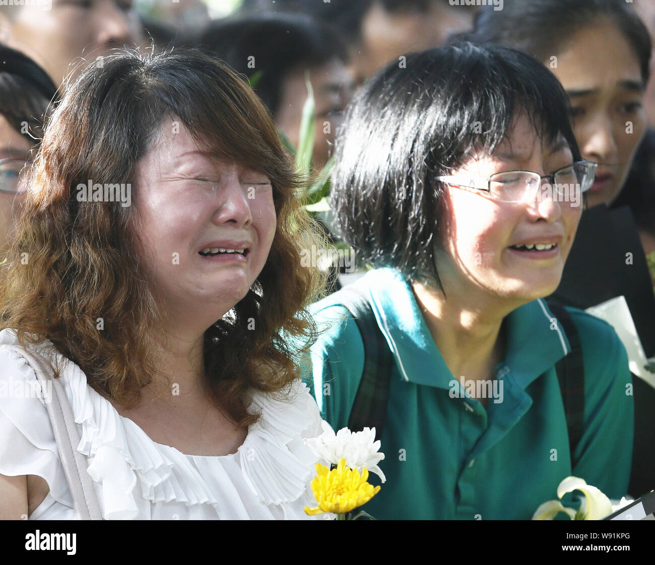 Family members and schoolmates of Chinese students Liu Yipeng, Wang ...